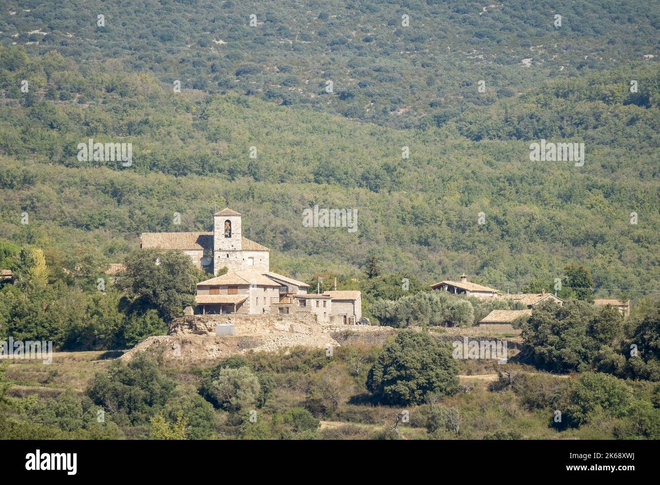 medieval stone built church with bell tower Stock Photo - Alamy