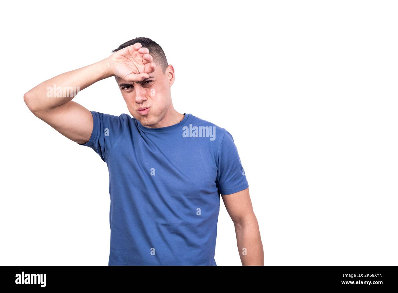 Man gesturing that he is hot with his arm Stock Photo - Alamy
