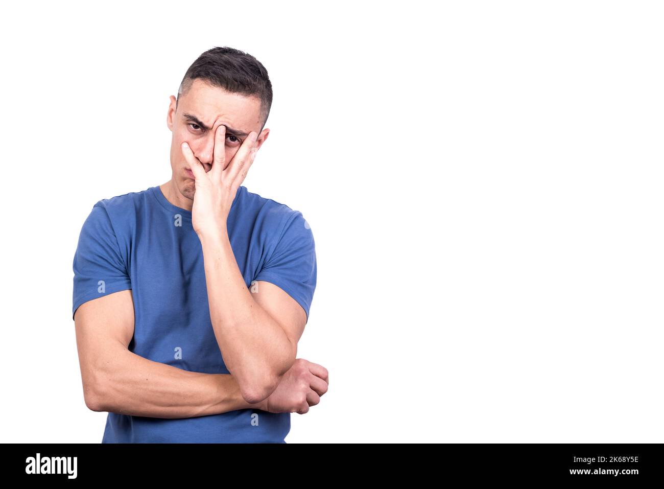 Man covering his face with his hand expressing shame Stock Photo - Alamy