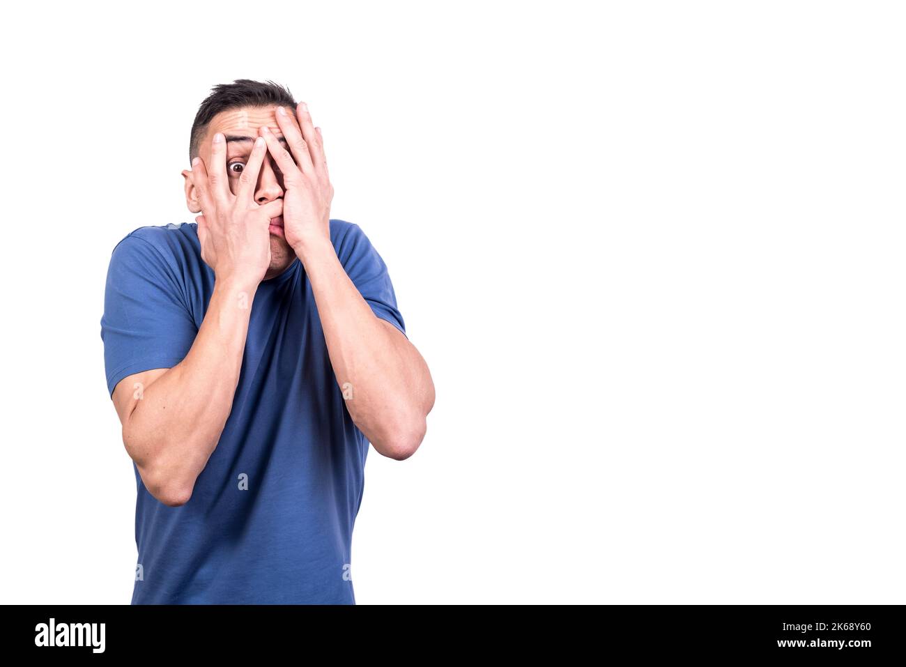 Man in fear covering his face with his hands Stock Photo - Alamy