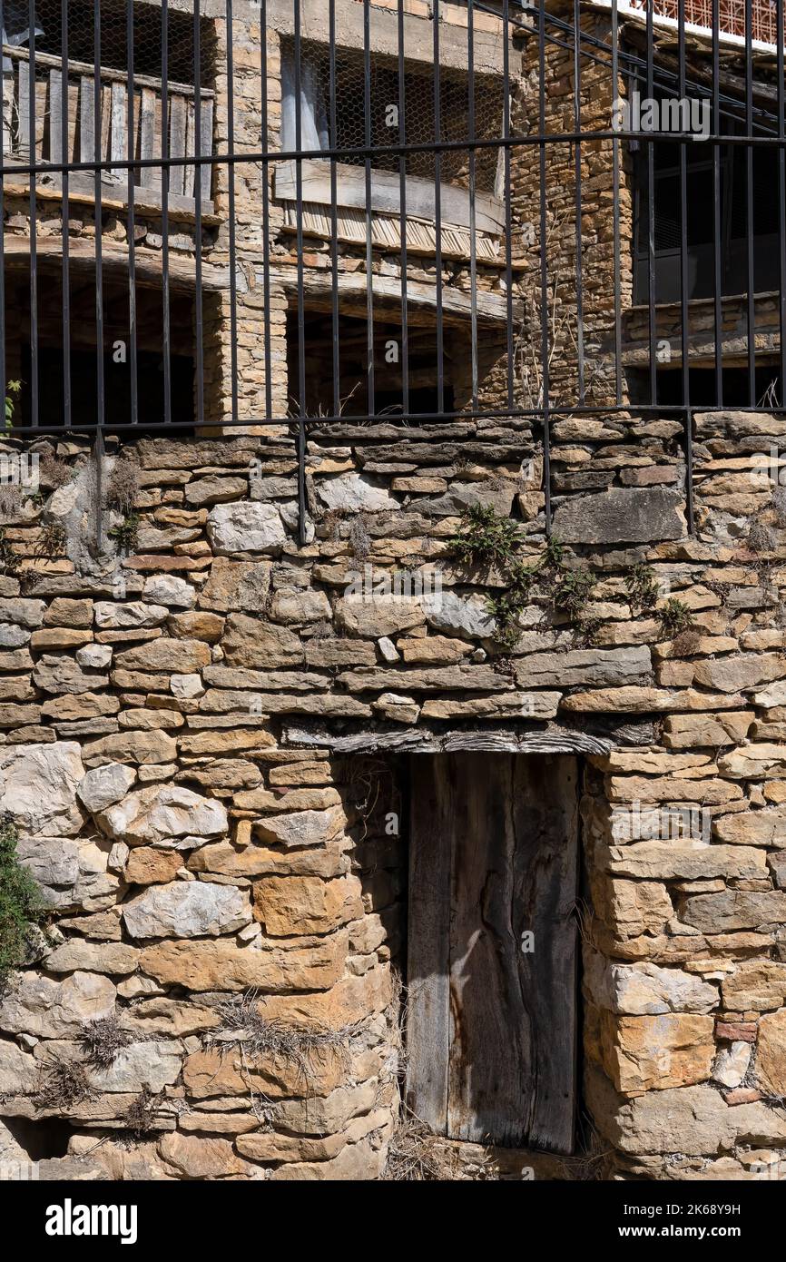 old Spanish beige stone village property in summer sunshine Stock Photo ...