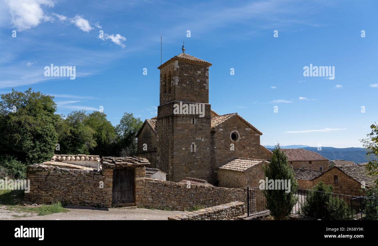 medieval stone built church with bell tower Stock Photo - Alamy