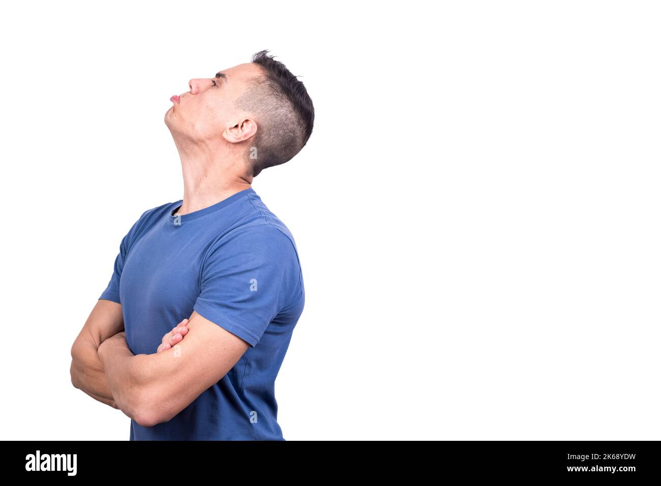 Man turned in profile with an expression of anger Stock Photo - Alamy