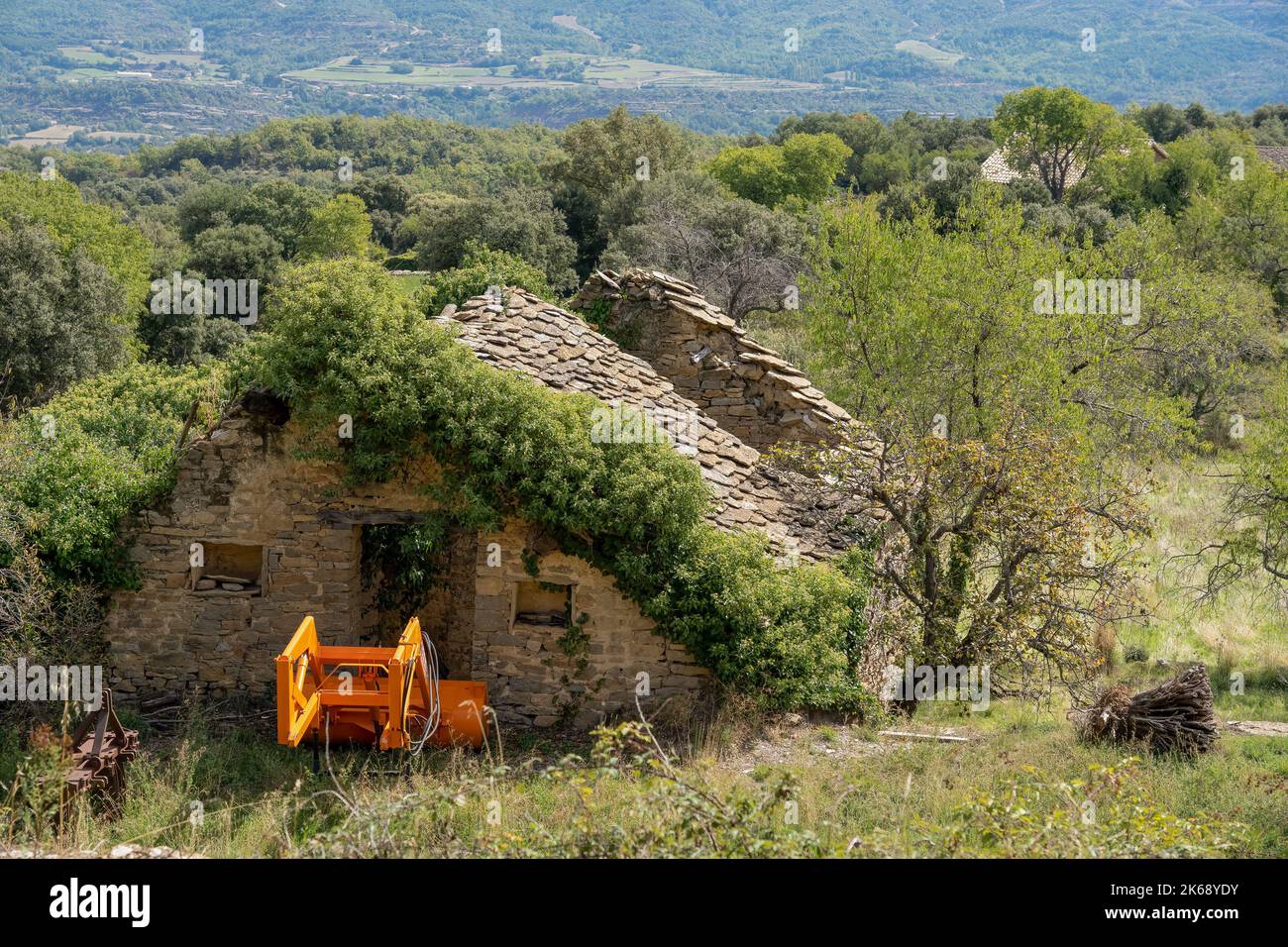 outside an old abandoned Spanish farm cottage with collapsing stone ...