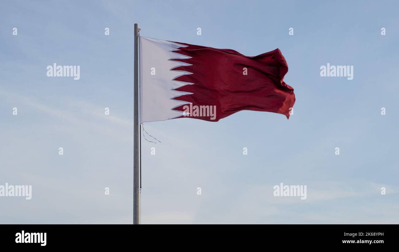doha,qatar- Ocotober 10,2022 : qatar flag flying high in the wind Stock ...