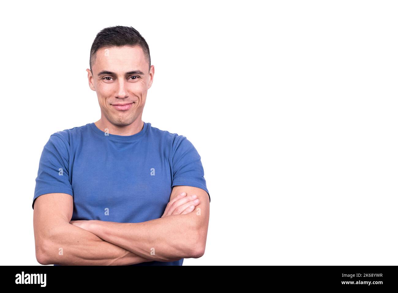 Smiling man standing with arms crossed and relaxed expression Stock ...