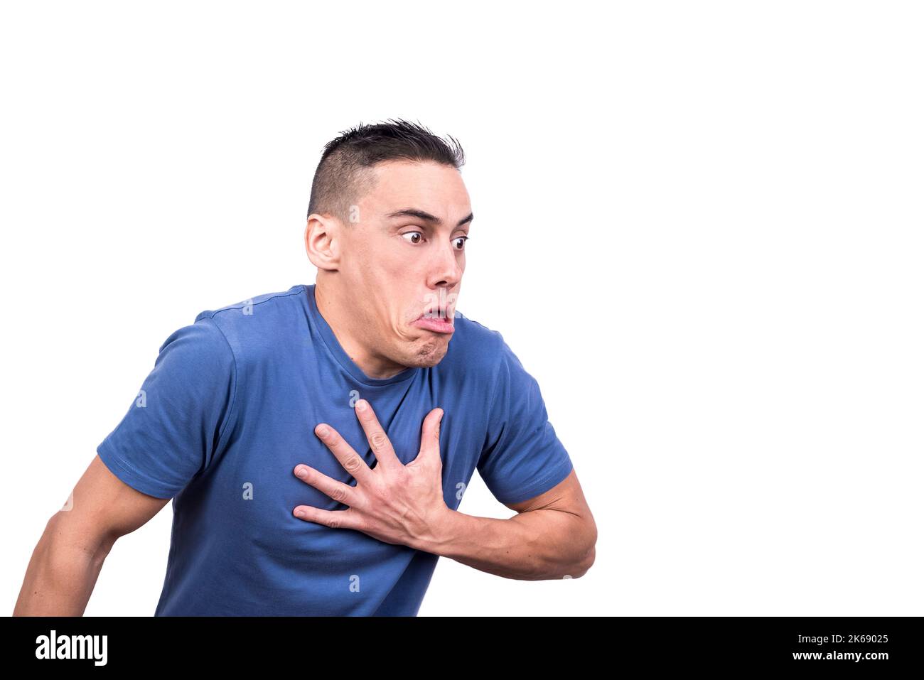 Man with hand on chest with surprised expression Stock Photo - Alamy
