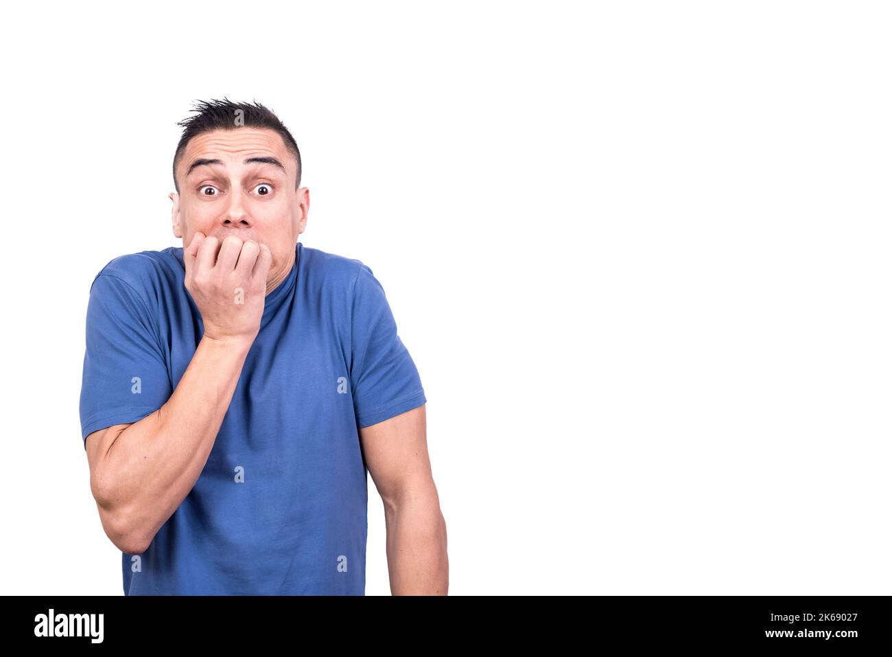 Man biting his nails with panicked expression Stock Photo - Alamy Man biting his nails with panicked expression Stock Photo - Alamy
