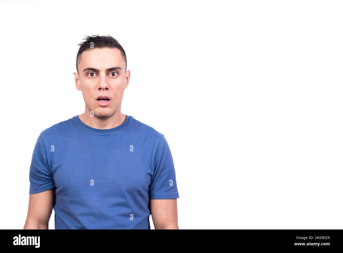 Man with blank stare and shocked expression Stock Photo - Alamy