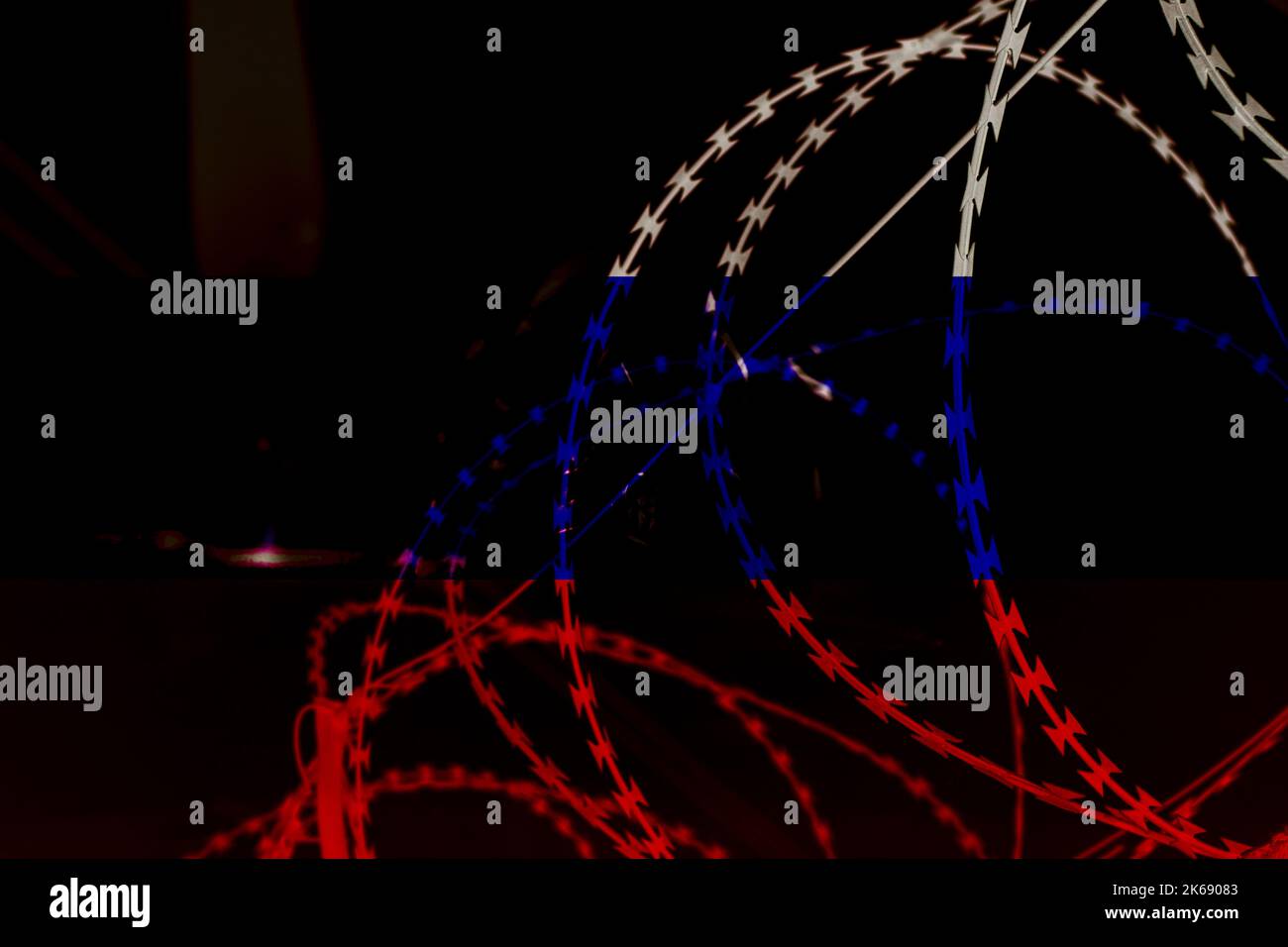 Flag of Russia on the background of barbed wire. War in Ukraine. Stop ...