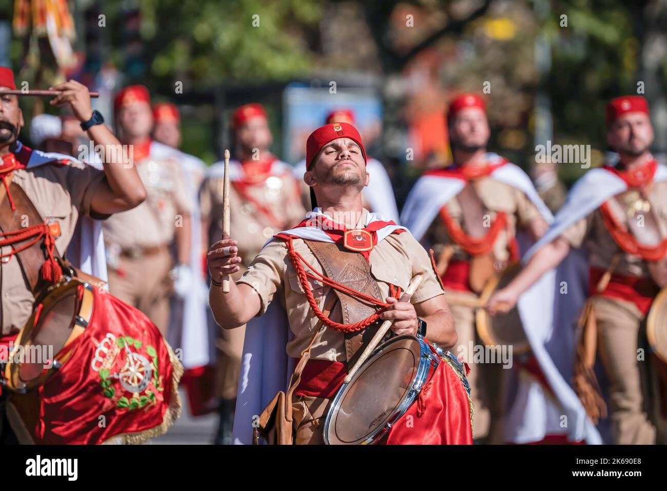 Military Spaniards with drums march during Hispanic Day parade in Paseo ...