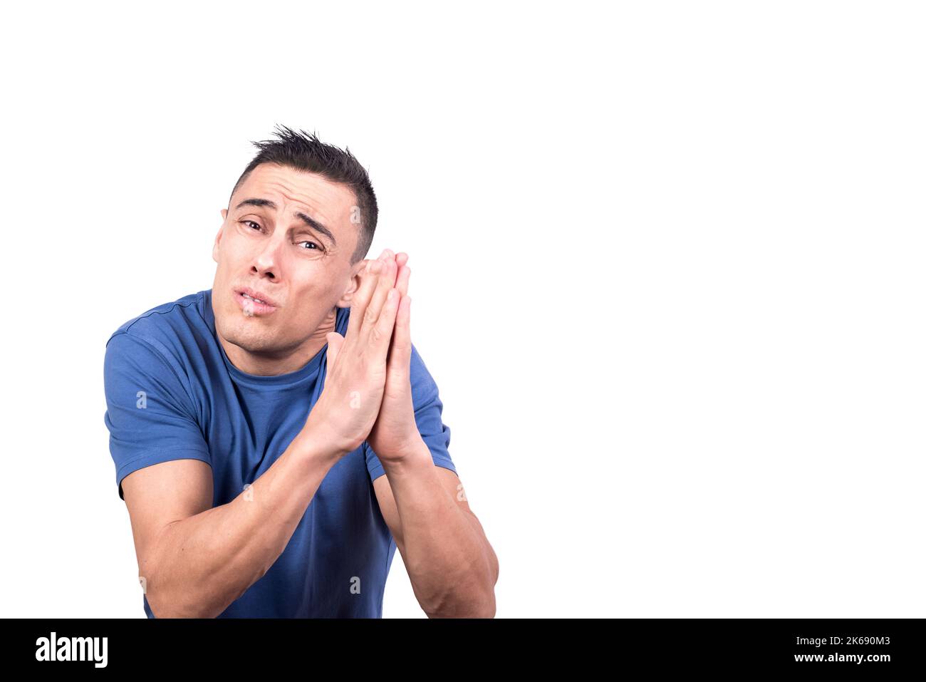 Man asking for forgiveness while gesturing with hands Stock Photo - Alamy