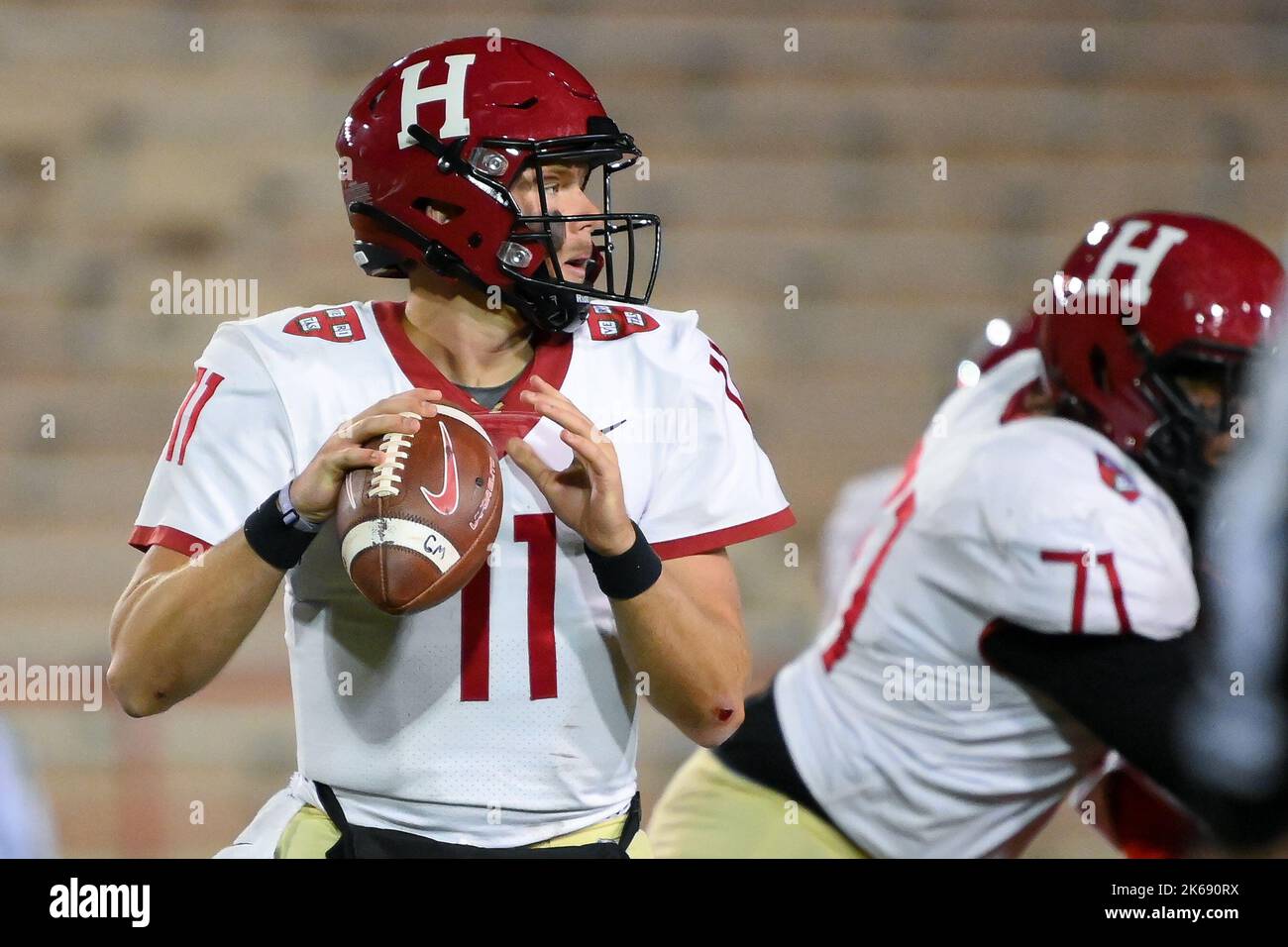 October 7, 2022: Harvard Crimson quarterback Charlie Dean (11) drops ...