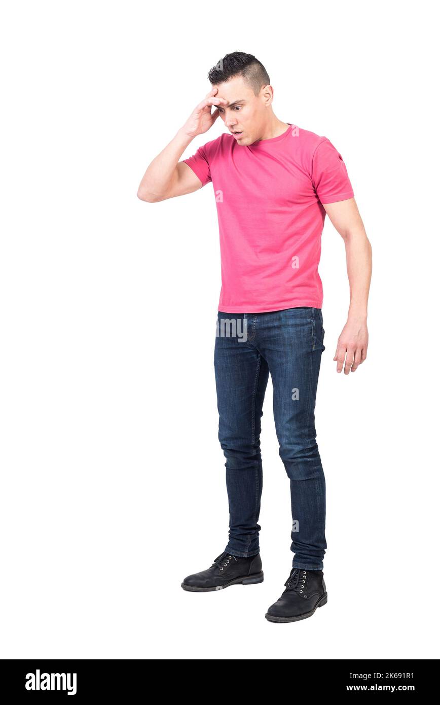 Upset guy touching head after making mistake Stock Photo - Alamy