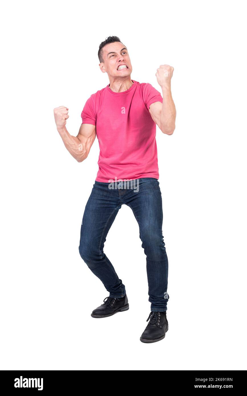 Hysterical guy grinding teeth nervously in white studio Stock Photo - Alamy