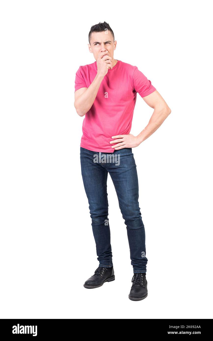 Thoughtful and doubting man with hand at chin Stock Photo - Alamy