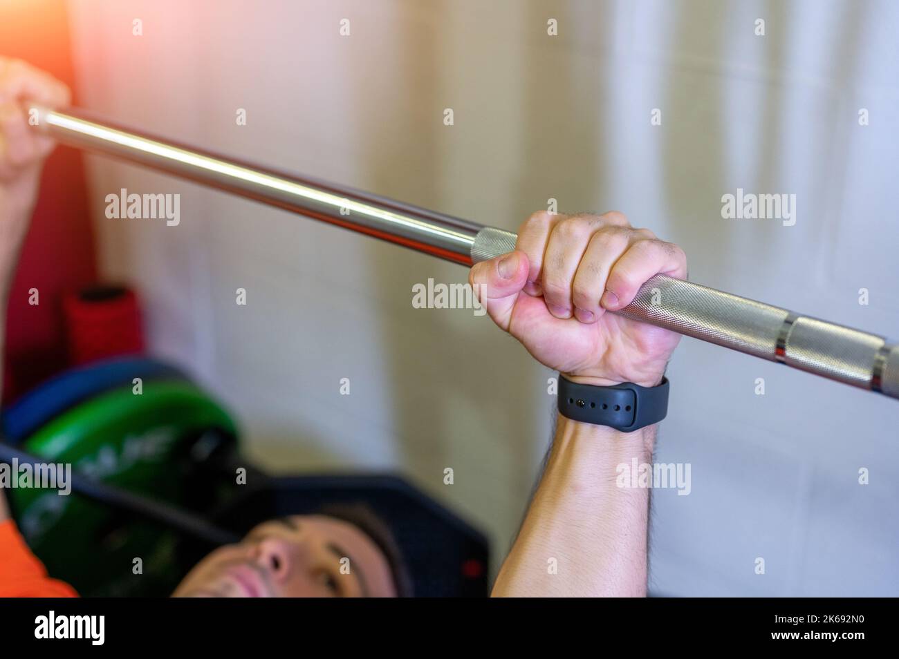 Conceptual image of hand grabbing the weight bar to start the bench ...