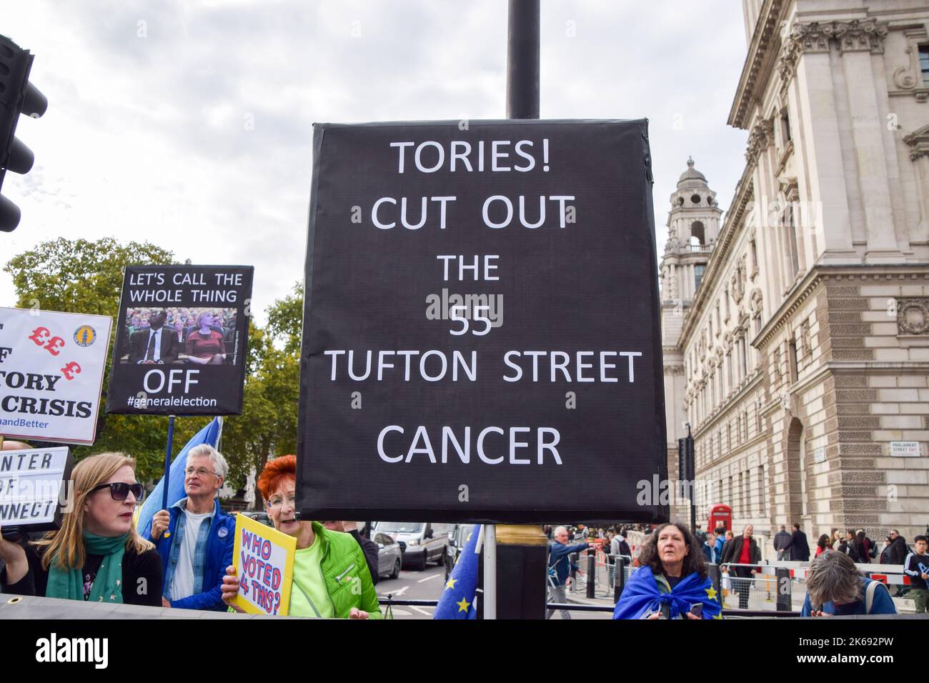 London, England, UK. 12th Oct, 2022. A protester holds a placard in ...