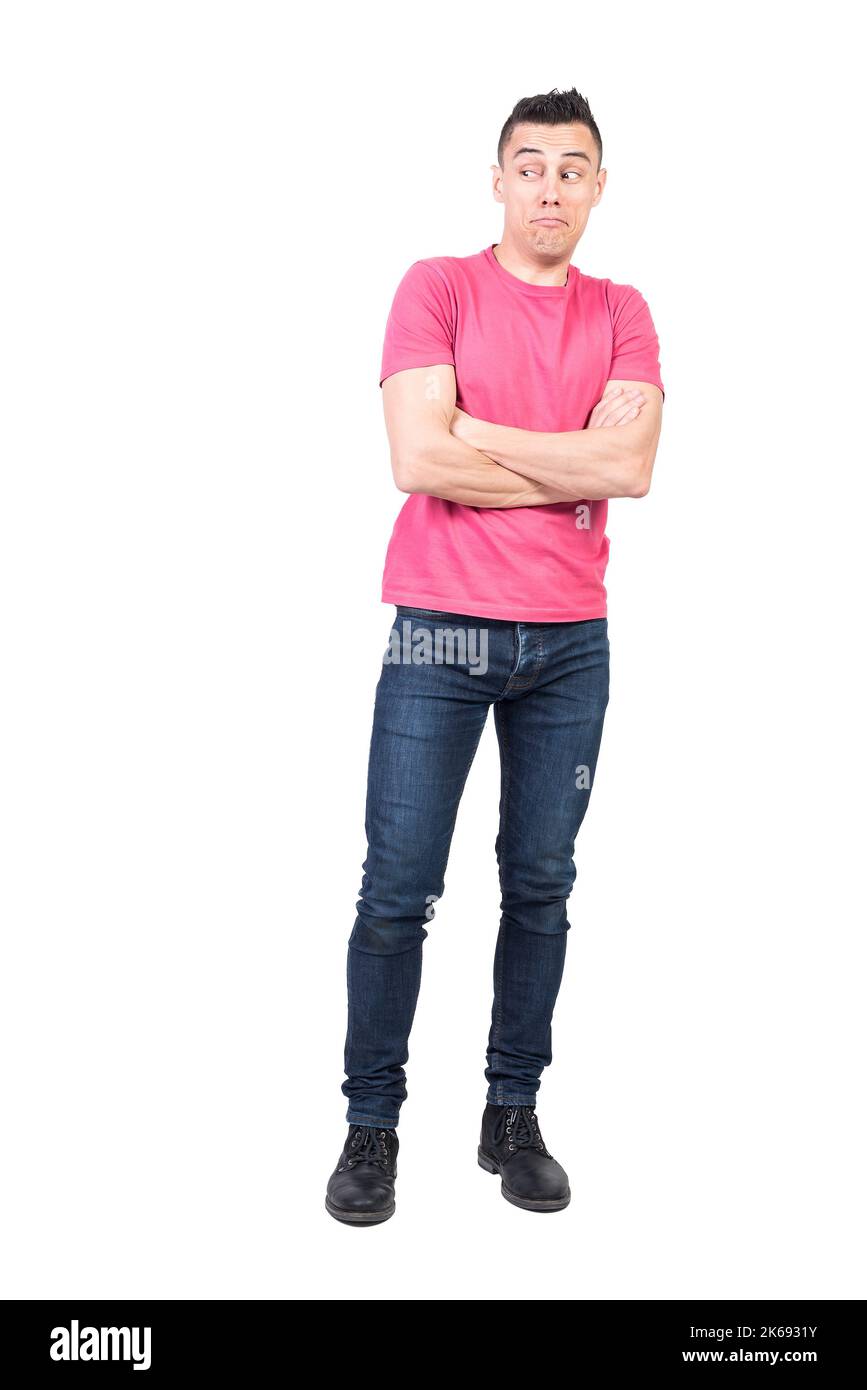 Surprised man with crossed arms. White background Stock Photo - Alamy