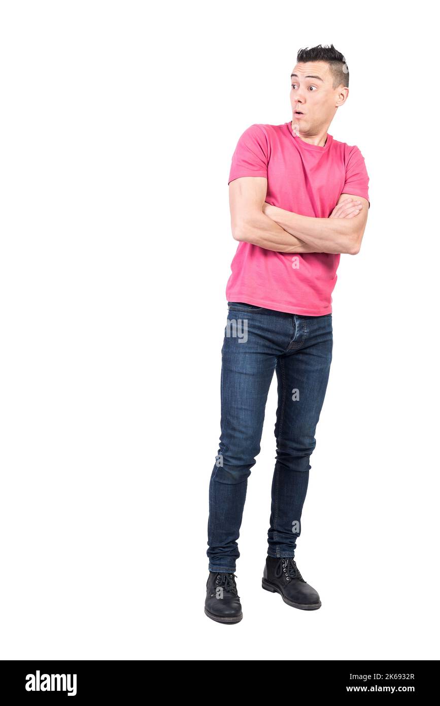Astonished man with crossed arms. White background Stock Photo - Alamy