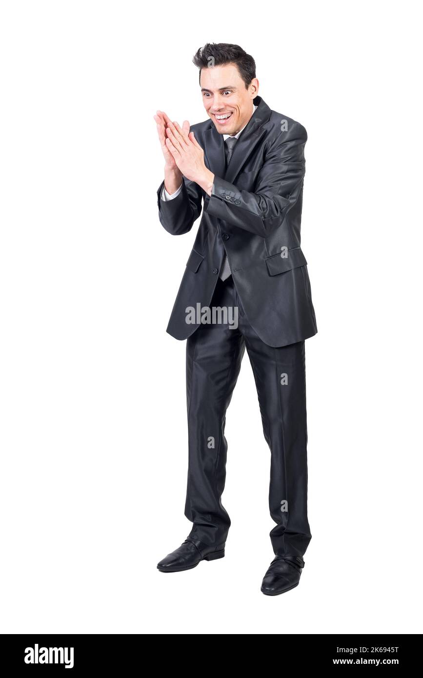 Cunning businessman rubbing hands in studio. White background Stock ...