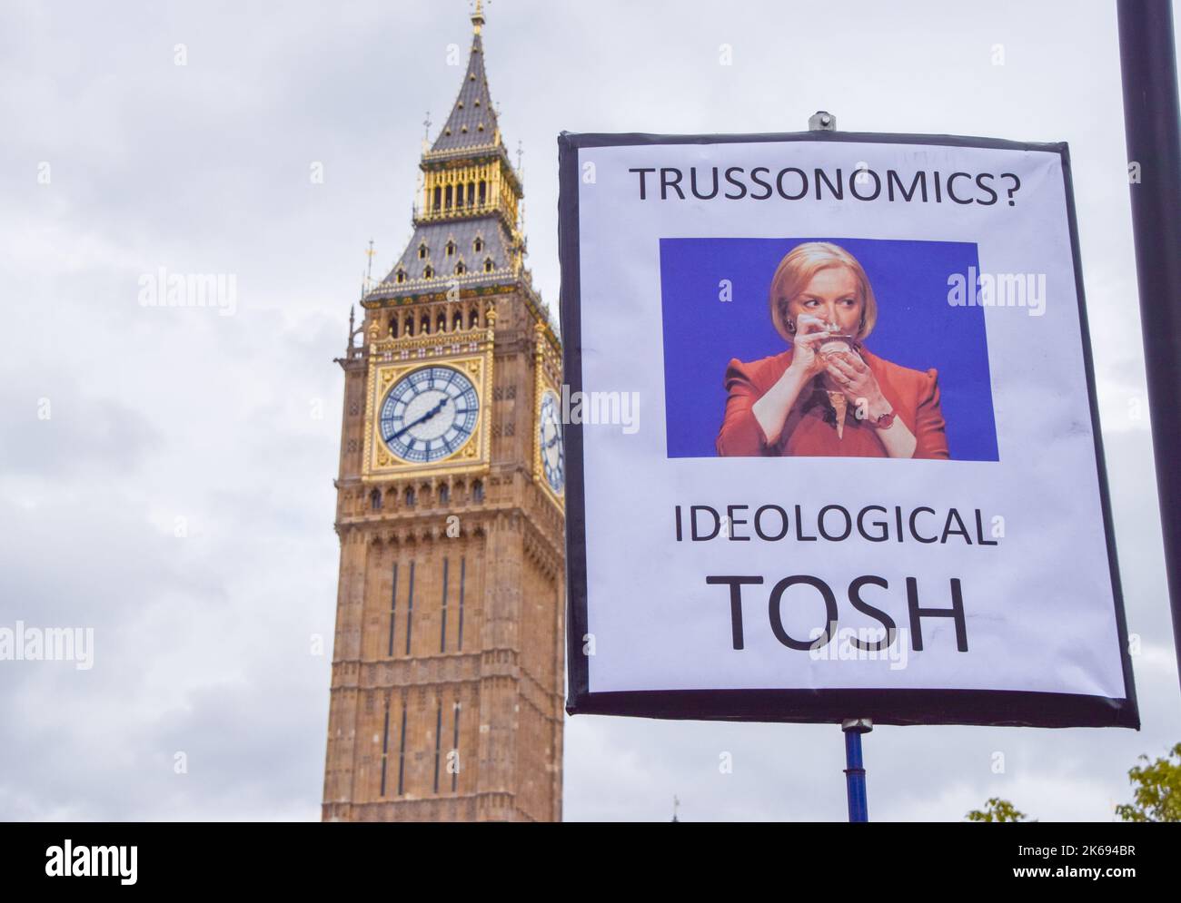 London, England, UK. 12th Oct, 2022. A protester holds a placard ...