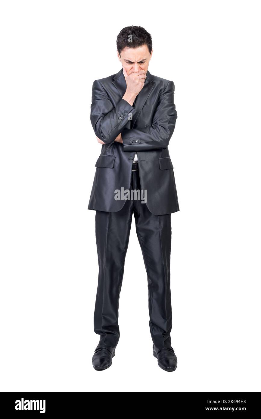 Preoccupied man in formal suit touching chin Stock Photo - Alamy