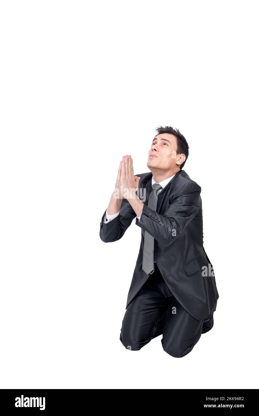Hopeful man begging for help on knees Stock Photo - Alamy