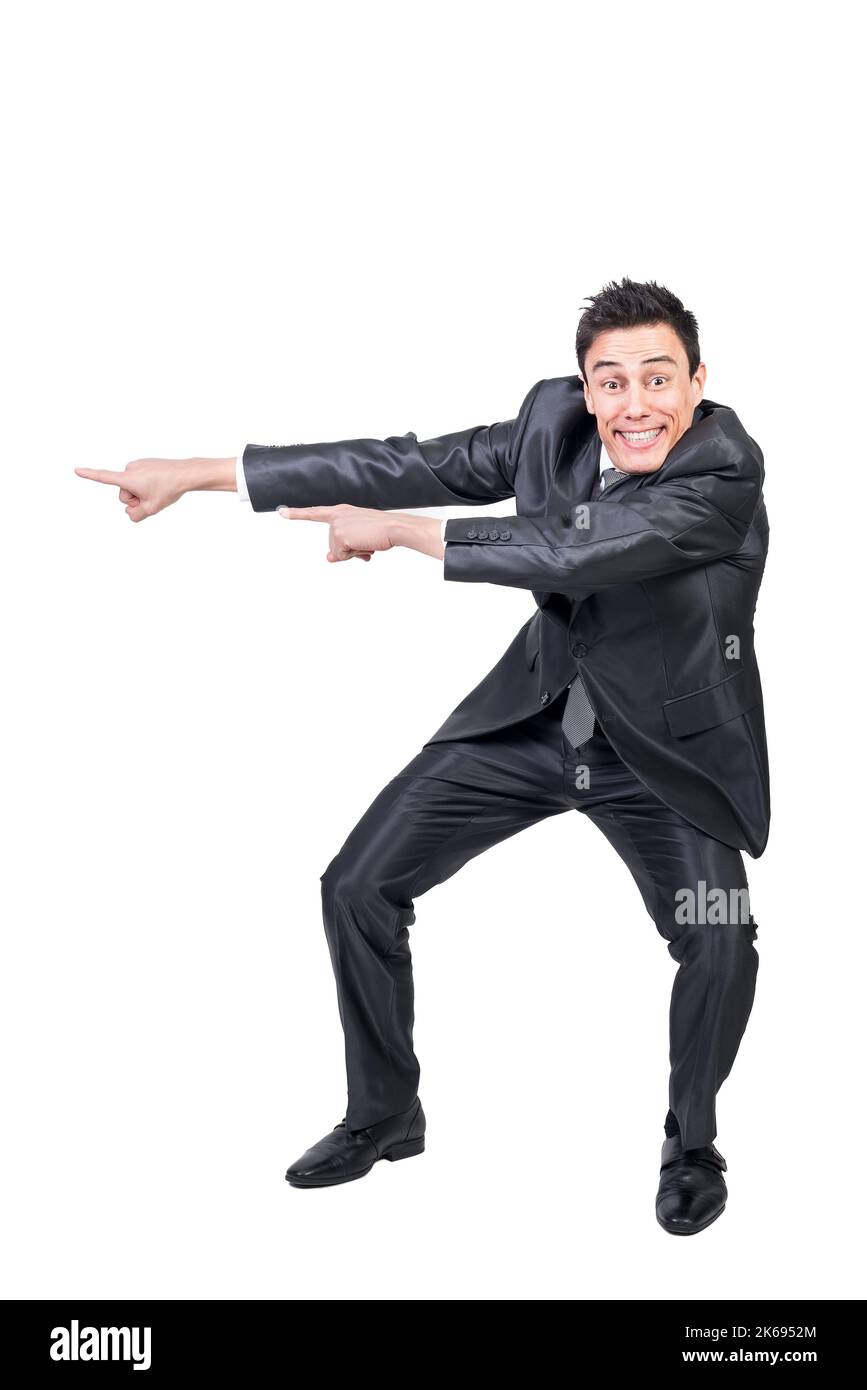 Positive man pointing aside in studio. White background Stock Photo - Alamy