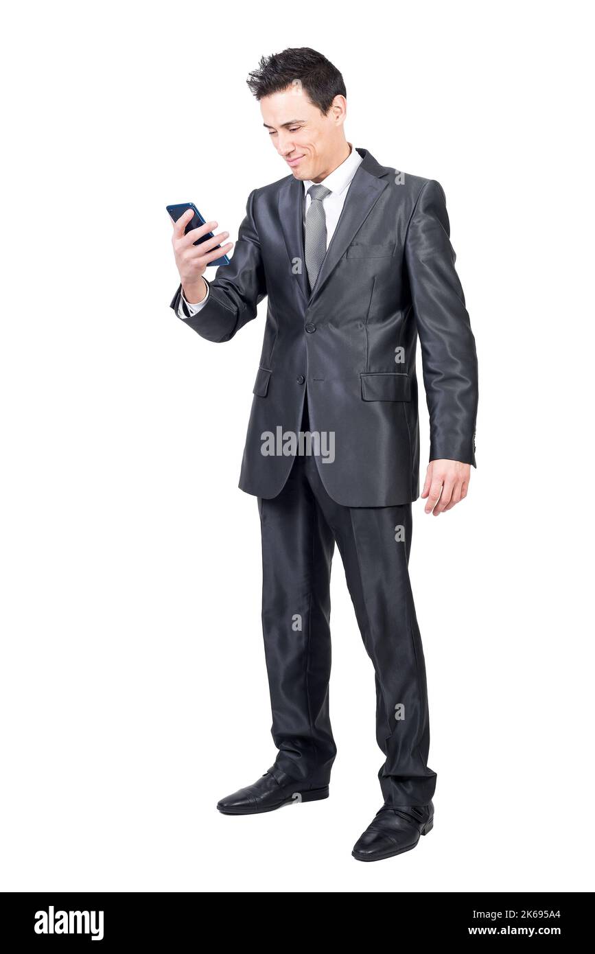 Content man in suit browsing smartphone. White background Stock Photo ...