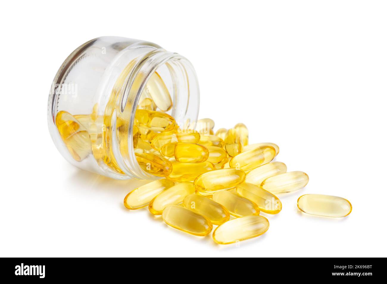 Omega 3 capsules in glass bottle isolated on white background. Softgels ...