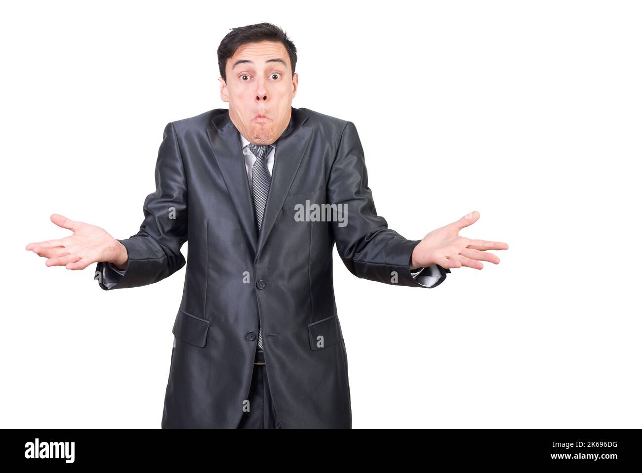 Doubting man in formal suit shrugging shoulders Stock Photo - Alamy