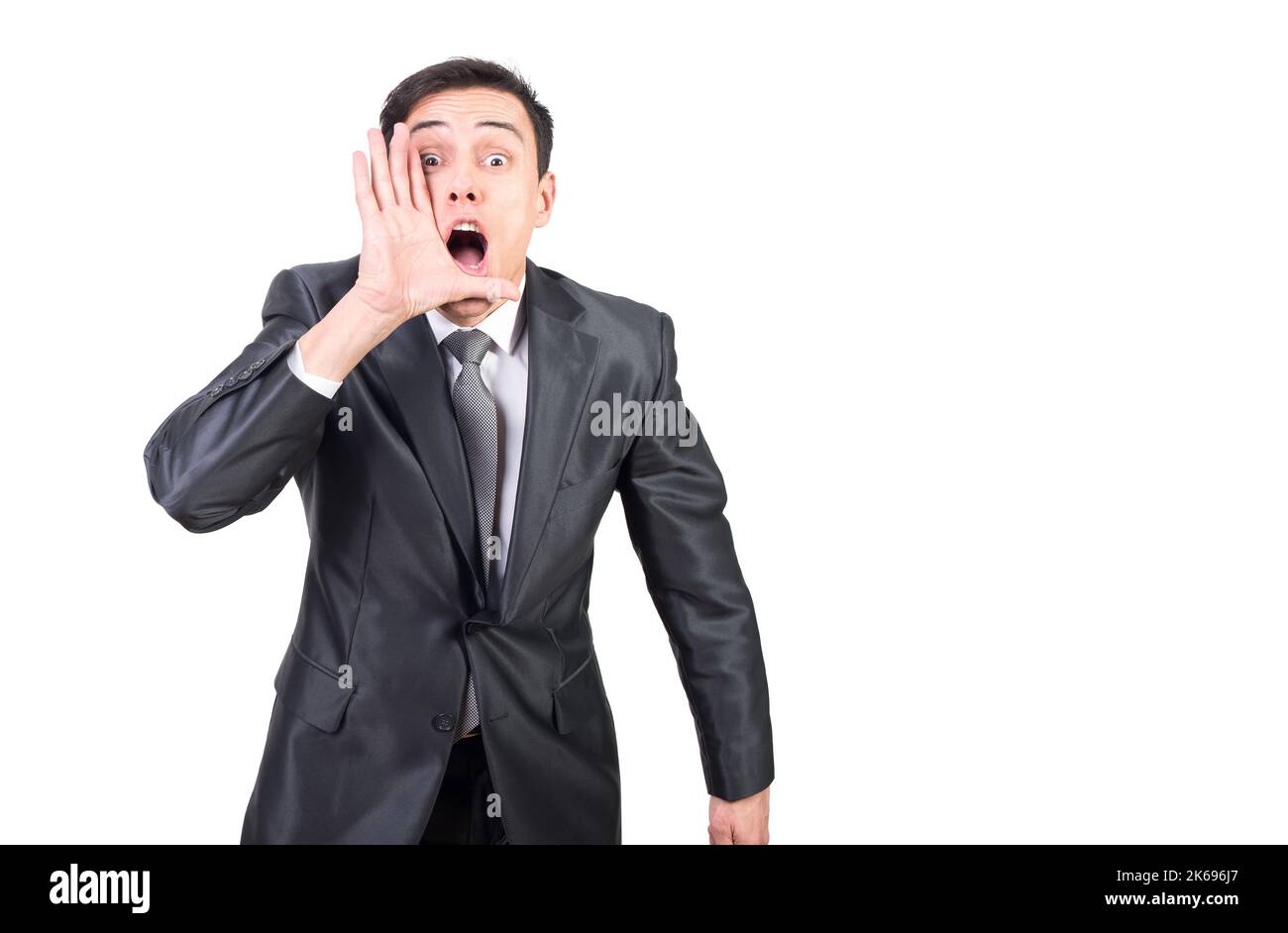 Excited handsome man talking shocking secret news Stock Photo - Alamy