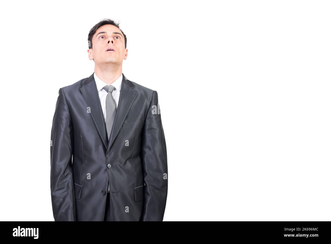 Possessed man in classy suit looking up Stock Photo - Alamy