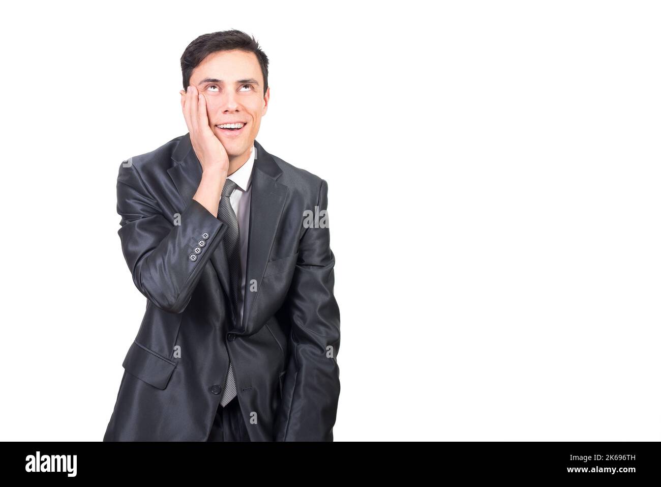 Cheerful handsome man touching face with pleasure Stock Photo - Alamy