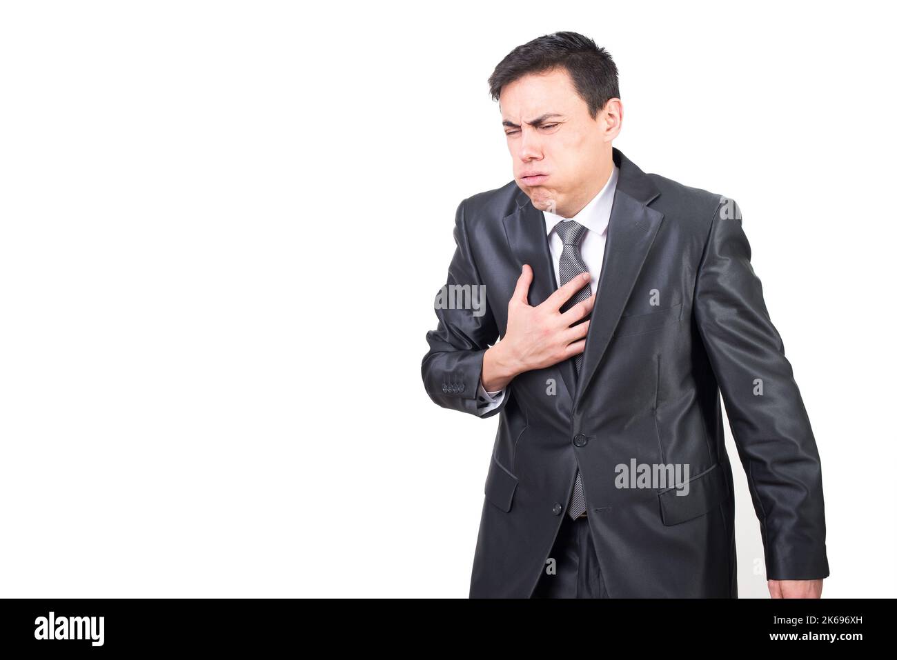 Man feeling ill and expressing pain in chest Stock Photo - Alamy