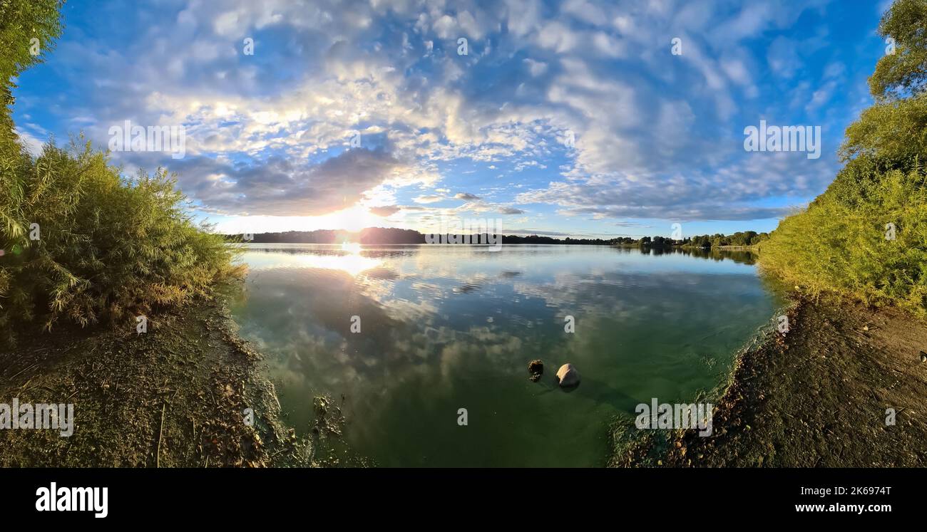 Beautiful landscape at a lake with a reflective water surface Stock ...