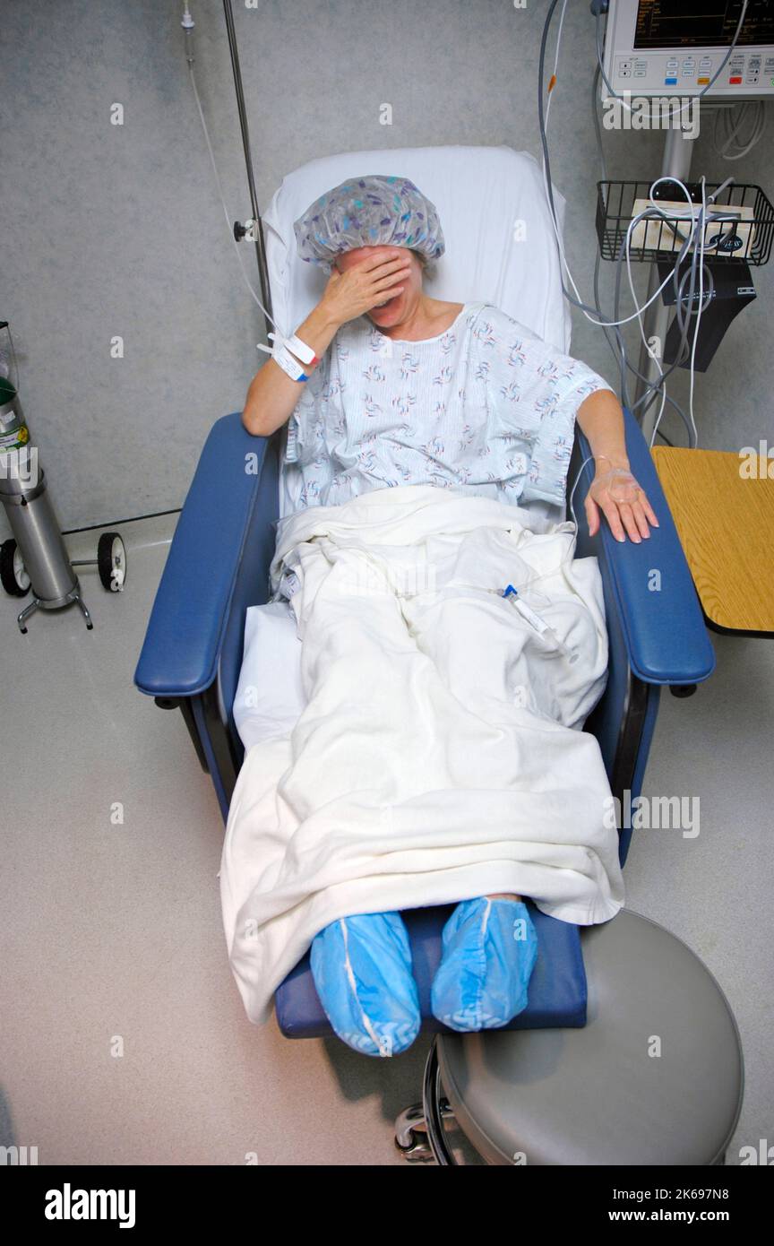 Woman hospital gown waiting hi-res stock photography and images - Alamy