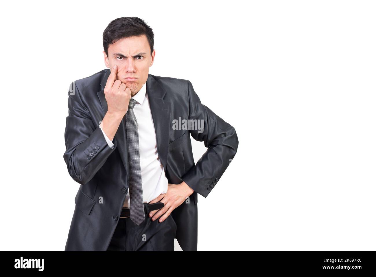 Strict man keeping eye and controlling staring at camera Stock Photo ...