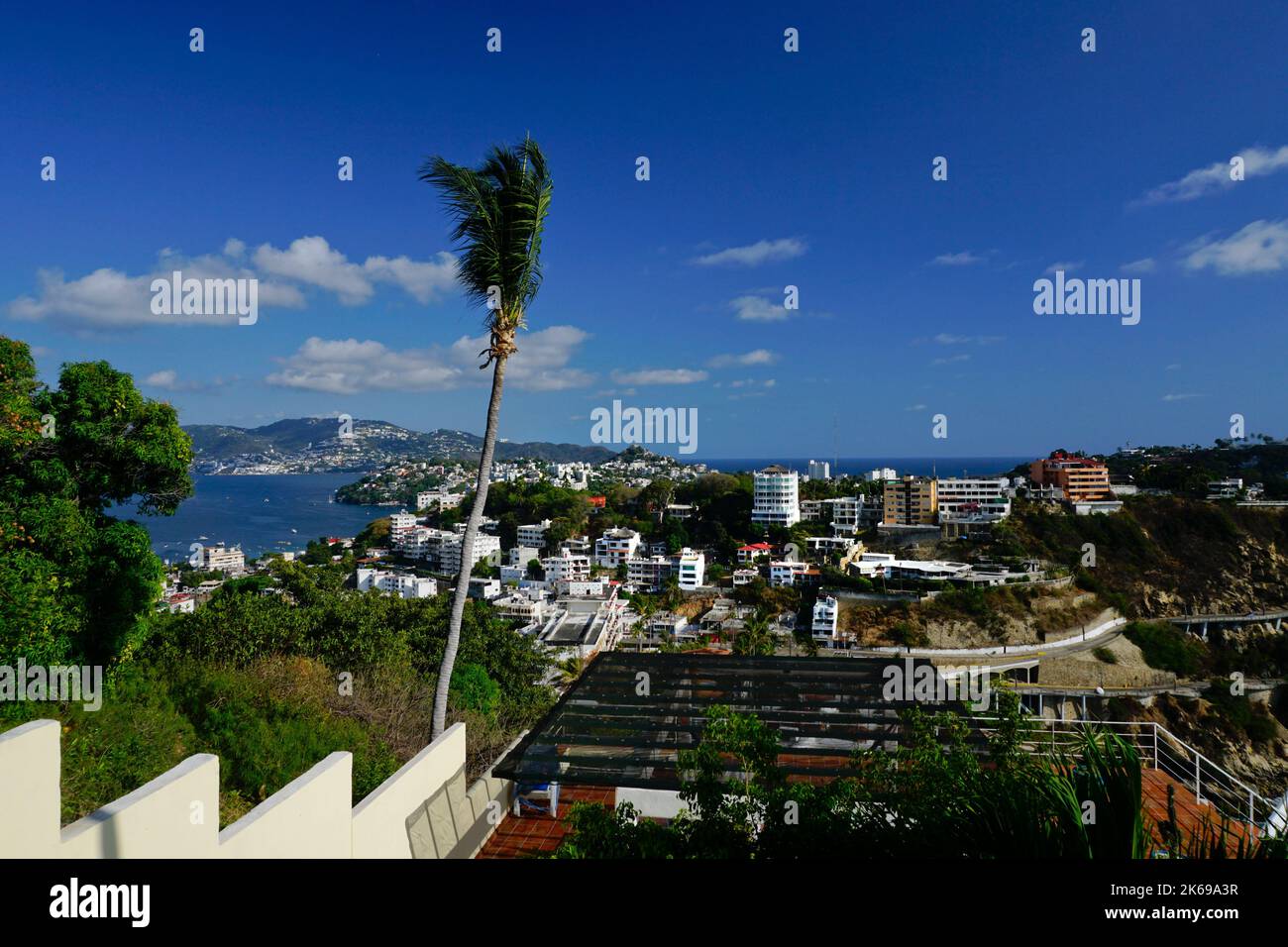 Hilly Las Playas and La Quebrada (foreground) neighborhoods on Acapulco ...