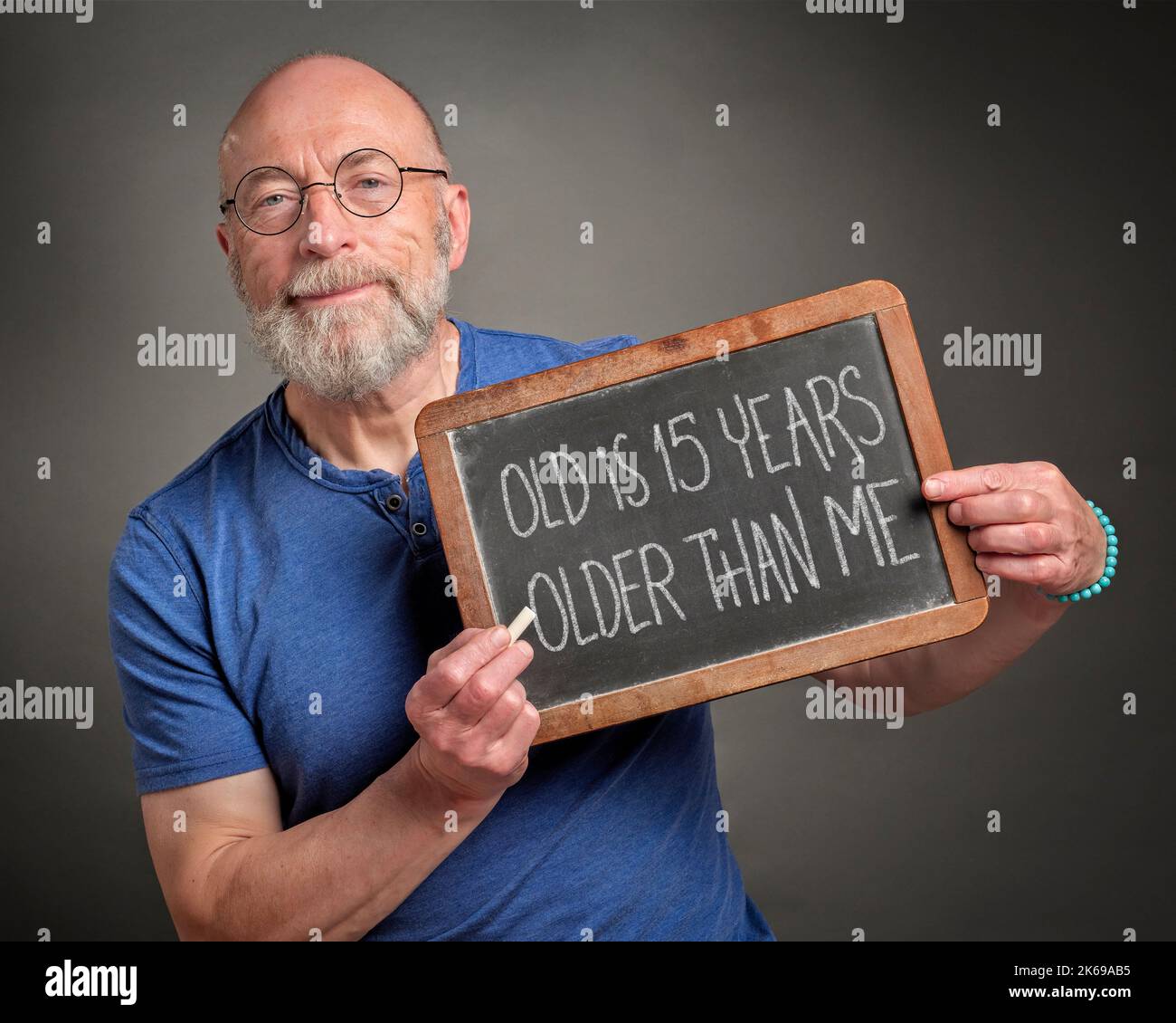 old is 15 years older than me - happy senior man (in late 60s) is ...