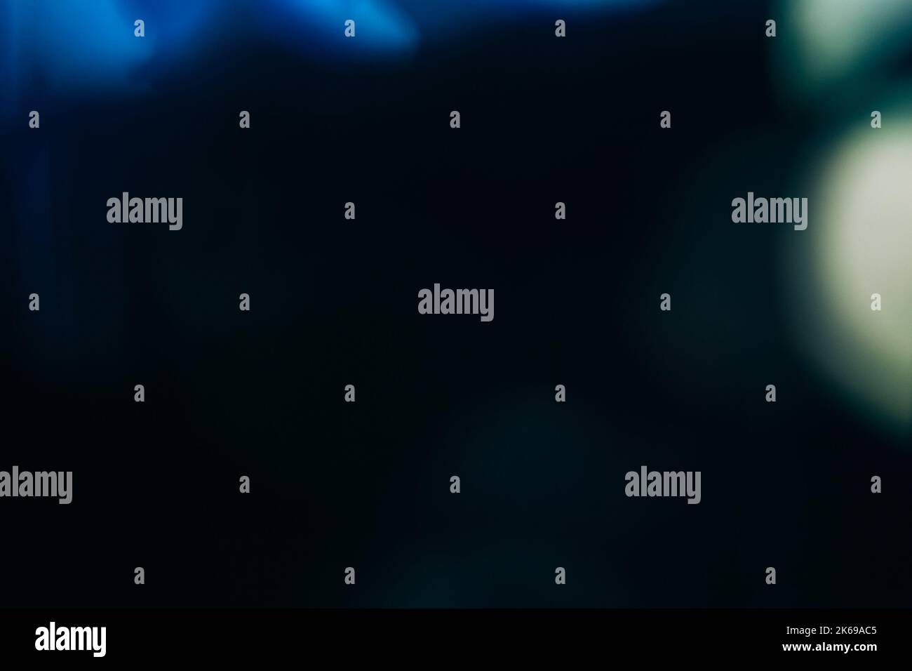 defocused glow background light flare blue black Stock Photo - Alamy