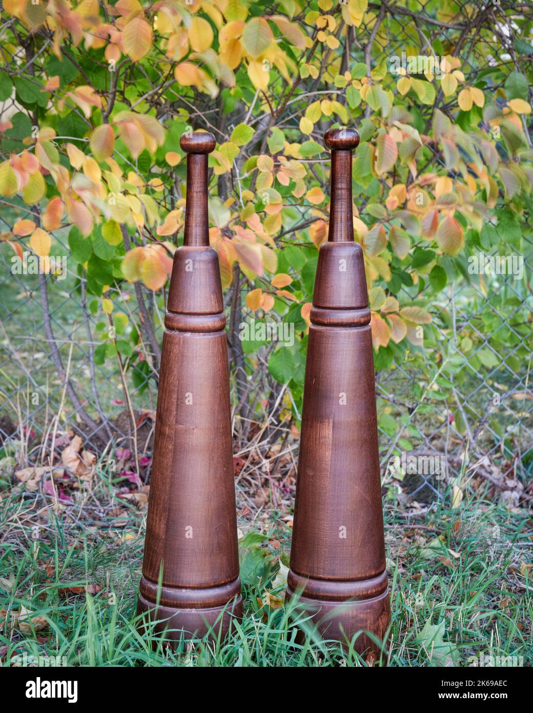 A couple of traditional wooden Persian meels in a backyard. They ...