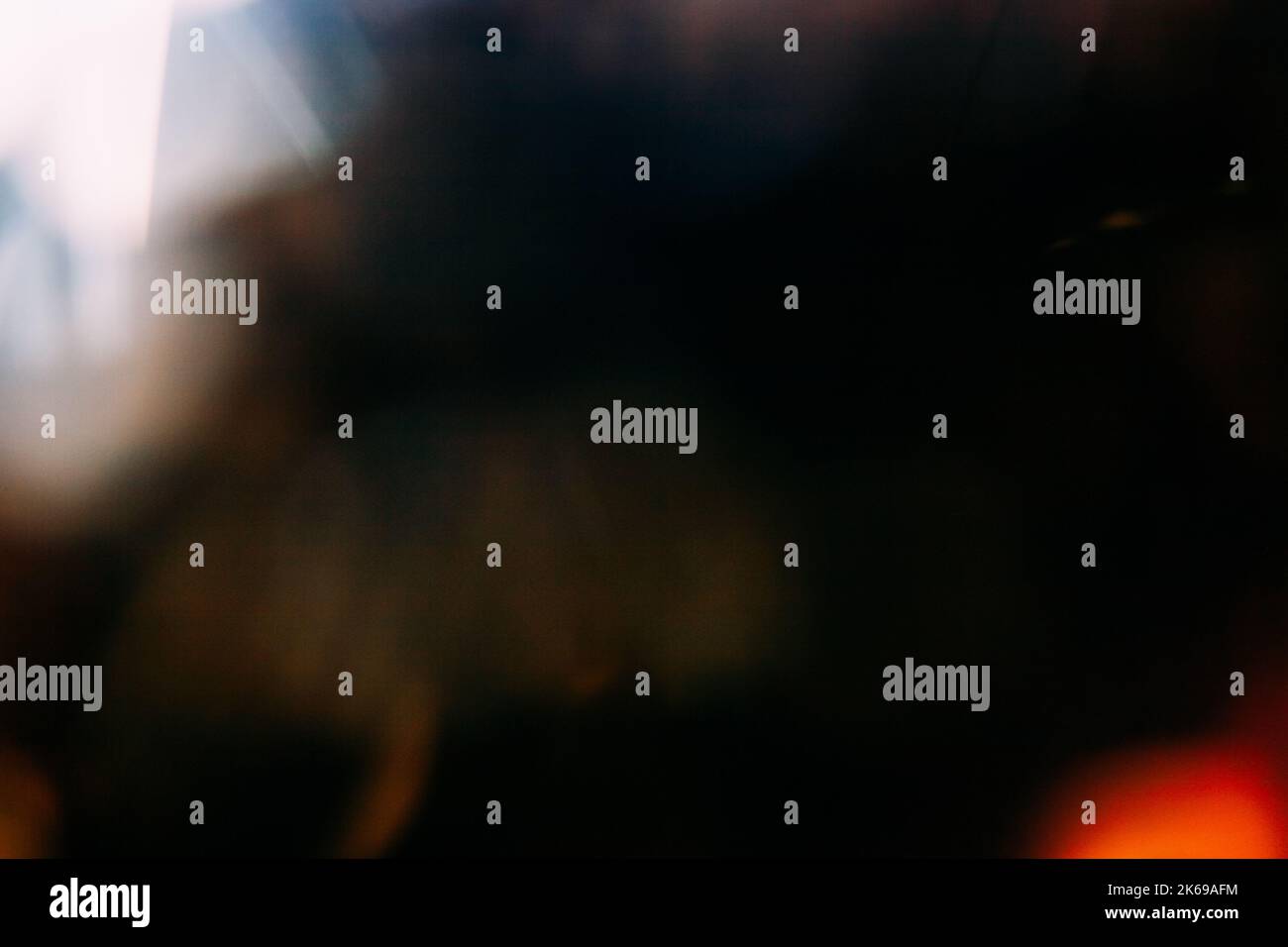 lens flare overlay bokeh light orange glow black Stock Photo - Alamy