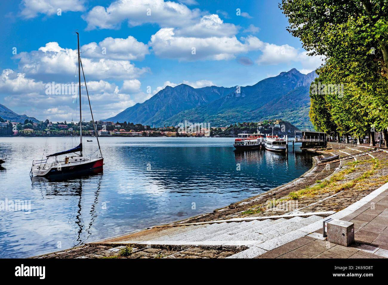 The harbour in Lecco on Lake Como, Italy with the Alps in the ...