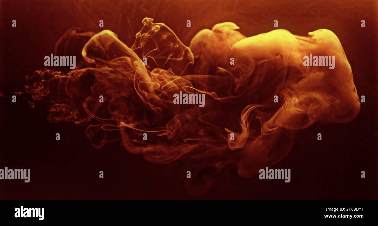 ink water drop color fluid shot orange red cloud Stock Photo - Alamy