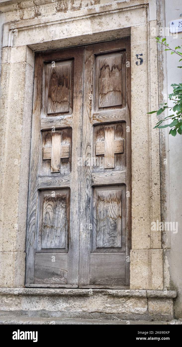 Old wooden door. Italian style Stock Photo - Alamy