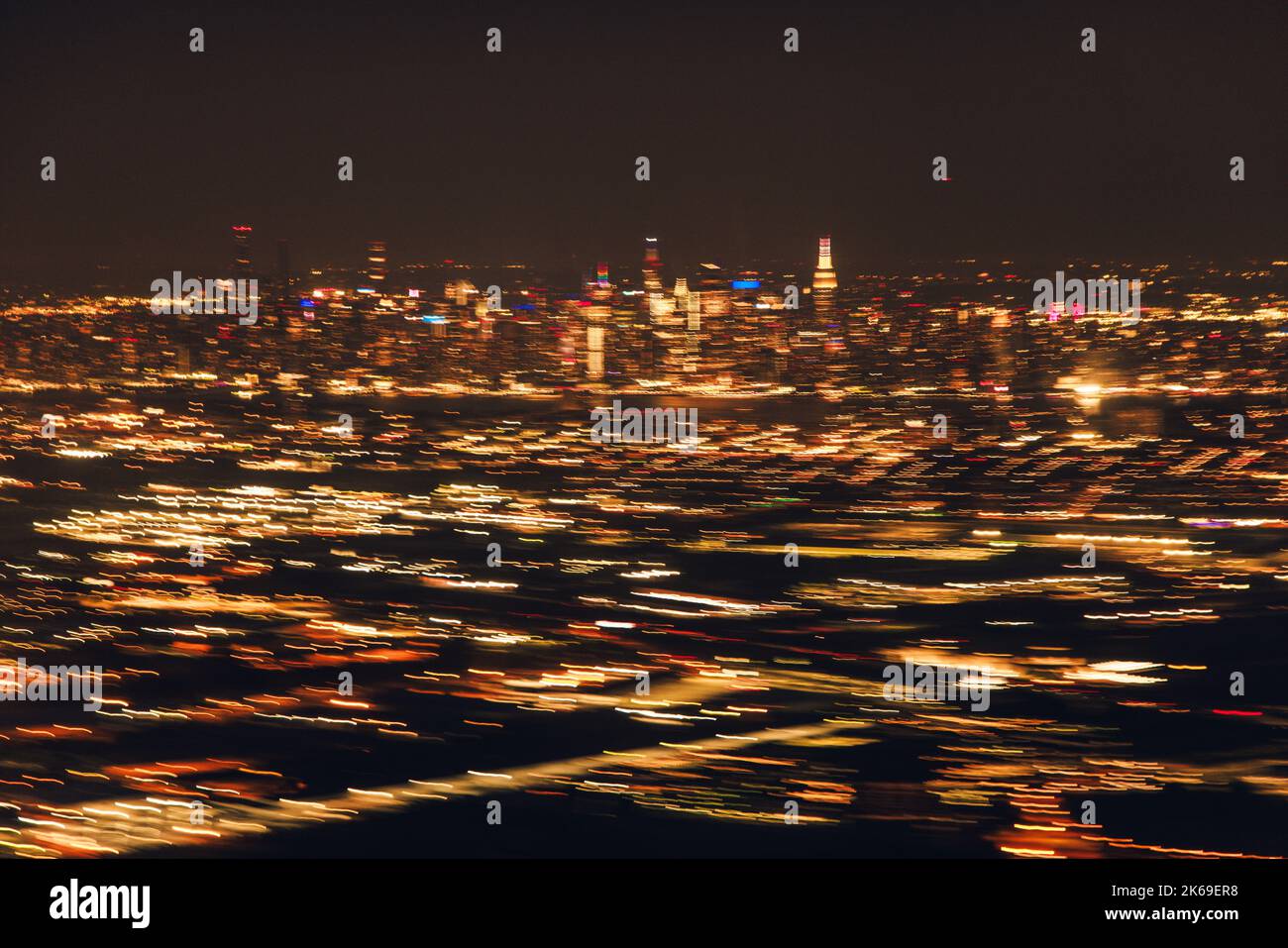 A blurred background of city lights at night Stock Photo - Alamy