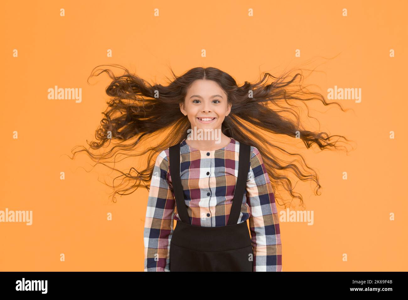 Extra light. Air in her hair. natural beauty. Girl kid long hair flying ...