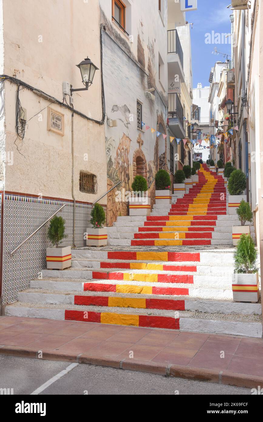 Steps painted in the colour of the Spanish Flag. Calpe, Alicante, Spai ...